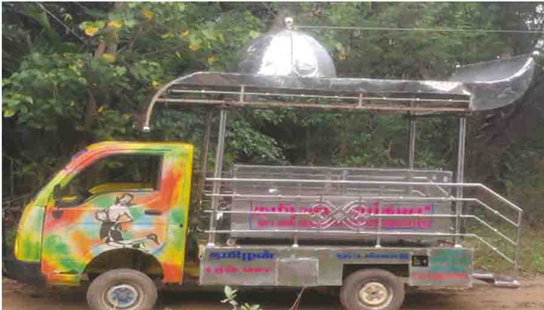 அமரர் ஊர்தியில் இருந்து பூக்கள் கொட்டவும், வழியில் பட்டாசு வெடிக்கவும் ...